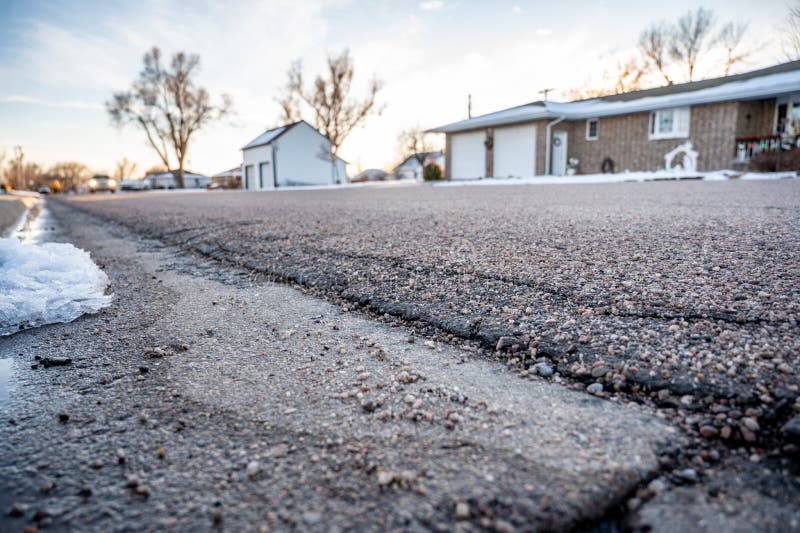 Low Angle Selective Focus on Asphalt Overlay Paving on Top of a ...