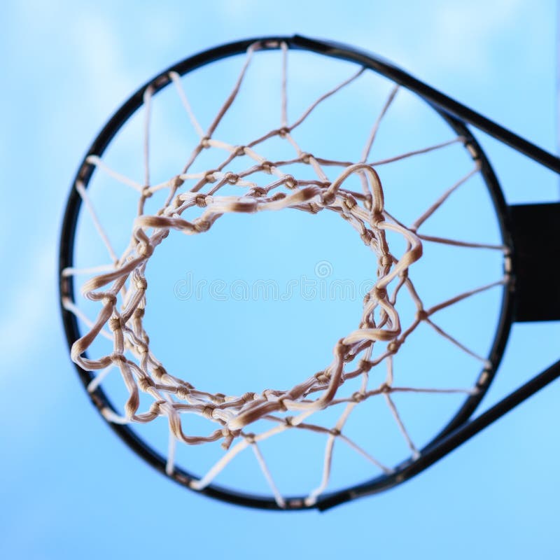 Low Angle Shot of a Basketball Hoop with a Net in the Playground Stock ...