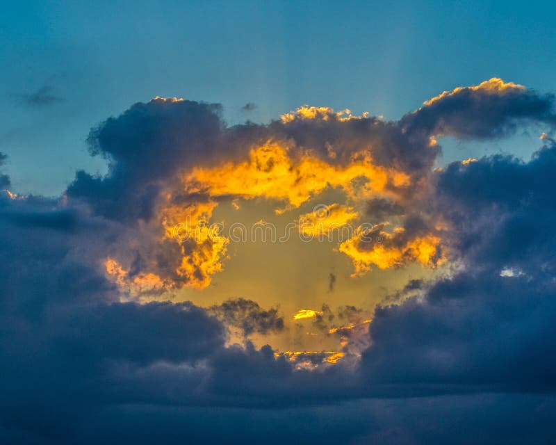 Low Angle Shot of a Beautiful Dramatic Cloudscape Illuminated by Sun ...