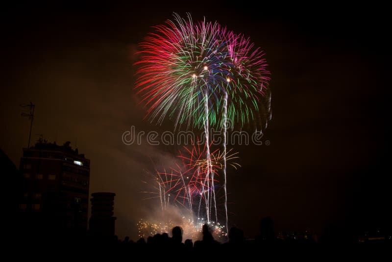 Low Angle Shot of Beautiful Fireworks Under the Night Sky Stock Photo ...