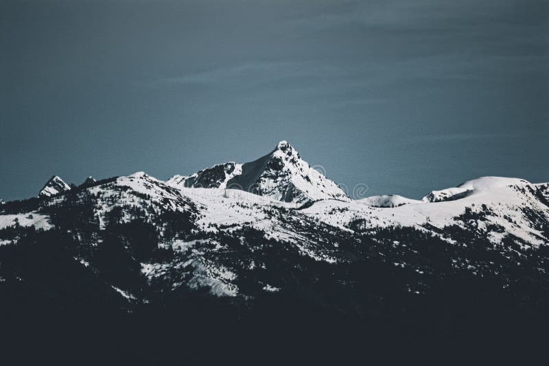 Low Angle Shot of the Beautiful Snow-covered Mountain Peak Captured on ...