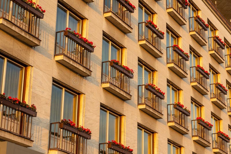 Low Angle Shot of a Beautiful Symmetric Building with Small Balconies ...