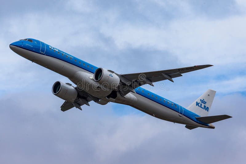Low Angle Shot of a Blue White KLM Plane Flying in the Sky Editorial ...