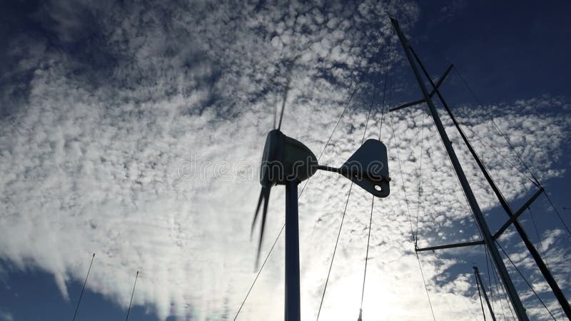 Low Angle Shot of Boat Wind Turbine Against a Cloudy Sky Stock Video ...