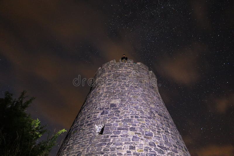 Low-angle Shot of a Brick Tower with a Scenic Night Sky in the ...