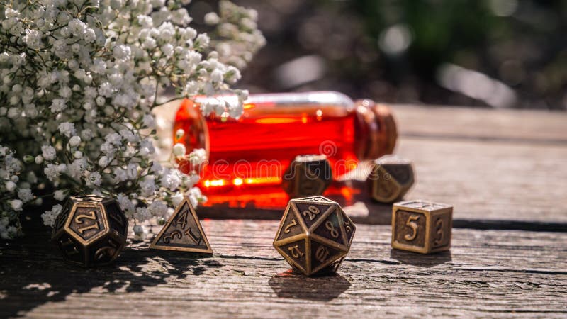 Low Angle Shot of a Bronze Role Playing Dice Set Stock Photo - Image of ...