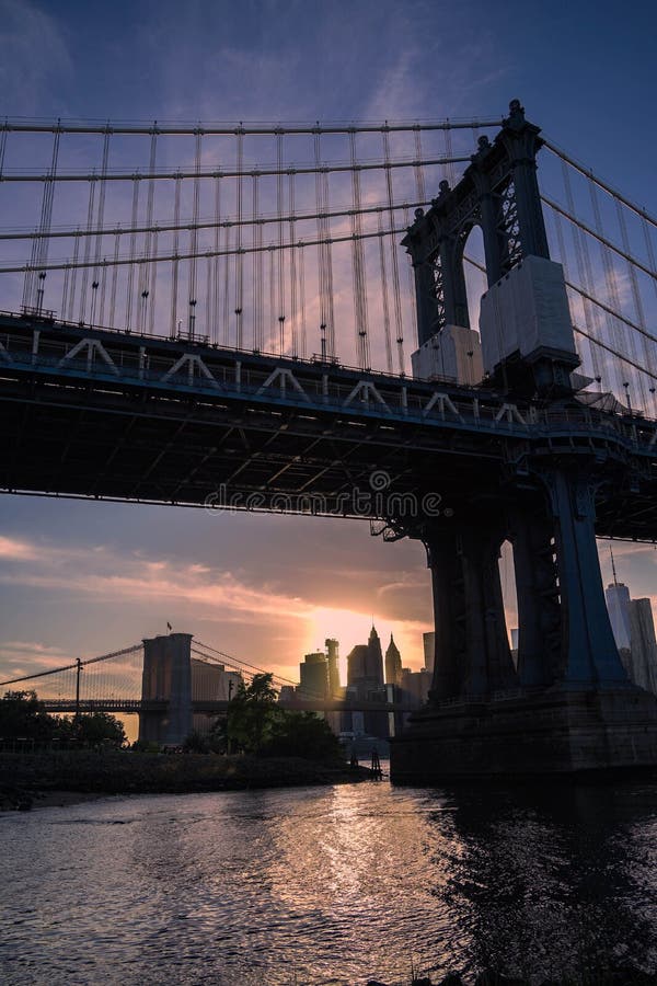 Low Angle Shot of Brooklyn Bridge on Colorful Sunset Sky Background ...
