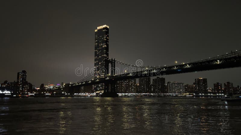 Low-angle Shot of the Brooklyn Bridge with the New York Skyline at ...