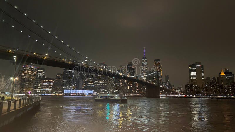 Low-angle Shot of the Brooklyn Bridge with the New York Skyline at ...