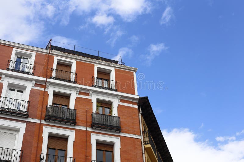 Low Angle Shot of a Building with a Brick Facade in Madrid Stock Photo ...
