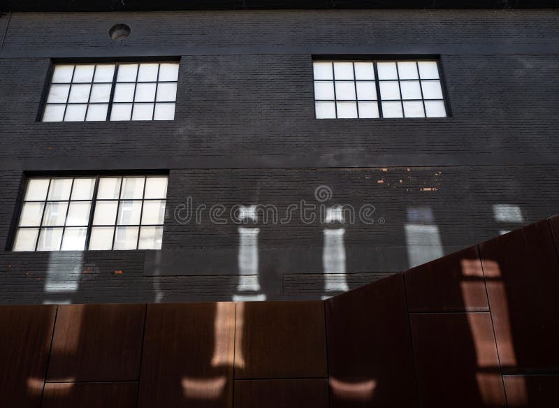 Low-angle Shot of a Building with Lights Falling on the Walls Stock ...