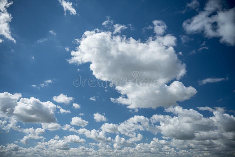 Low Angle Shot of the Clouds in the Bright Blue Sky Stock Photo - Image ...