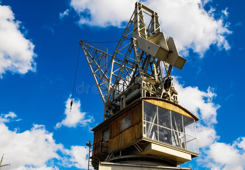 Low Angle Shot of a Crane with a Cloudy Blue Sky in the Background ...
