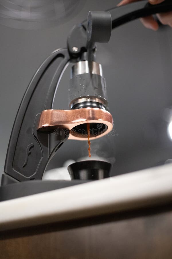 Low Angle Shot of an Espresso Machine Creating Aromatic Coffee Manually ...