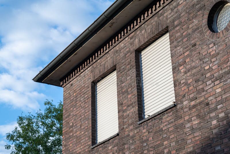 Low Angle Shot of the Exterior of a Simple Brown Brick Building Stock ...