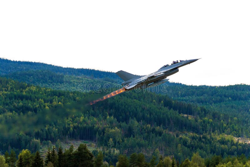 Low-angle Shot of a Fighter Jet Taking Off with Engine Flames Stock ...