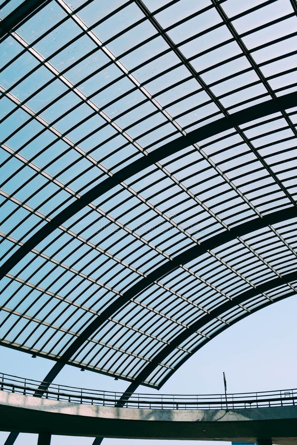 Low Angle Shot of a Glass Roof of a Modern Building Under the Blue Sky ...