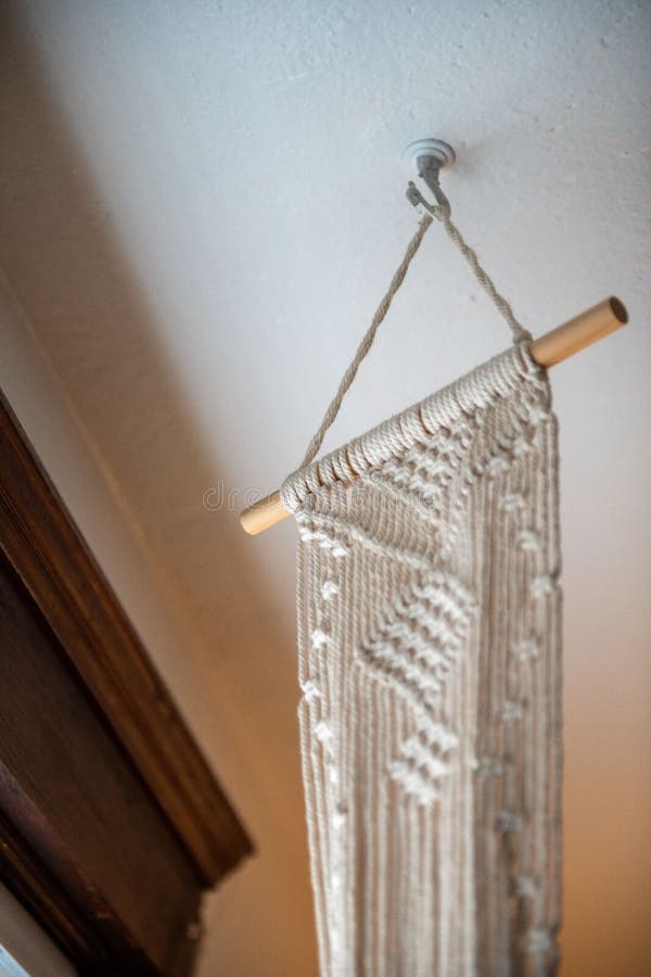 Low Angle Shot of a Handmade Macrame Decoration Hanging from the ...