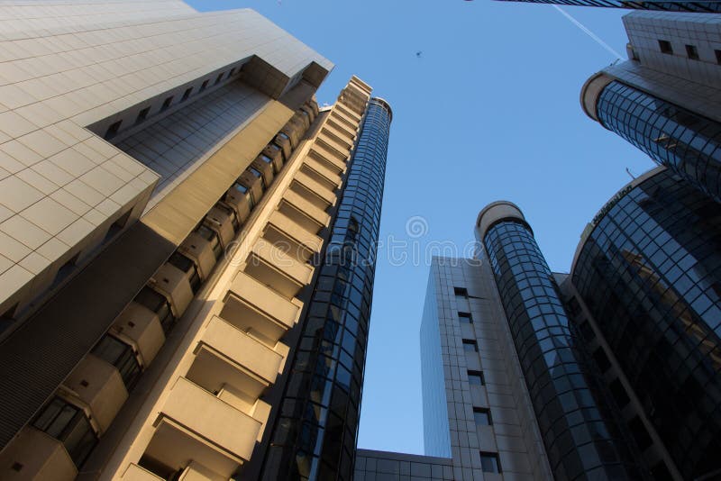 Low Angle Shot of High-rise Buildings Under a Clear Blue Sky Editorial ...