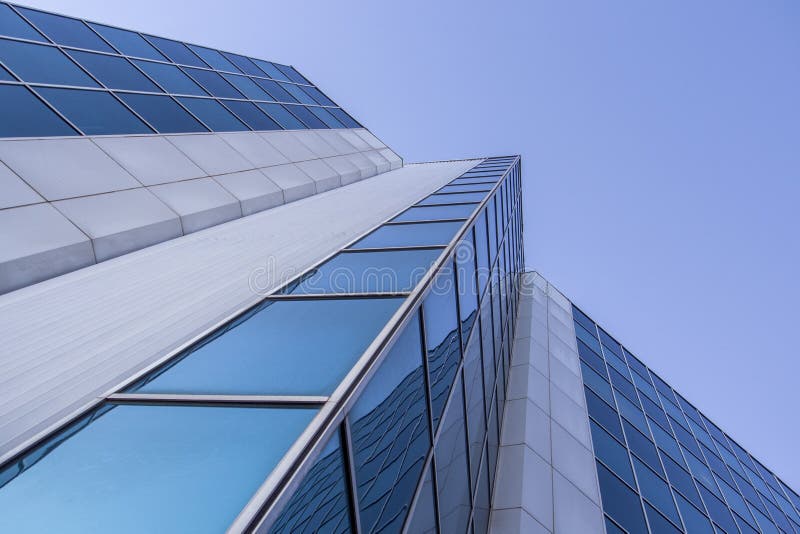 Low Angle Shot of a High-rise Modern Building in a Glass Facade Stock ...