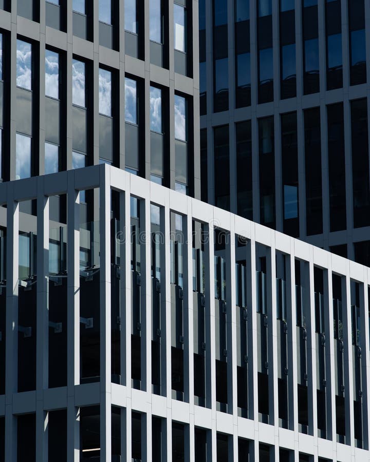Low Angle Shot of a High Rise Modern Building in the Middle of the City ...