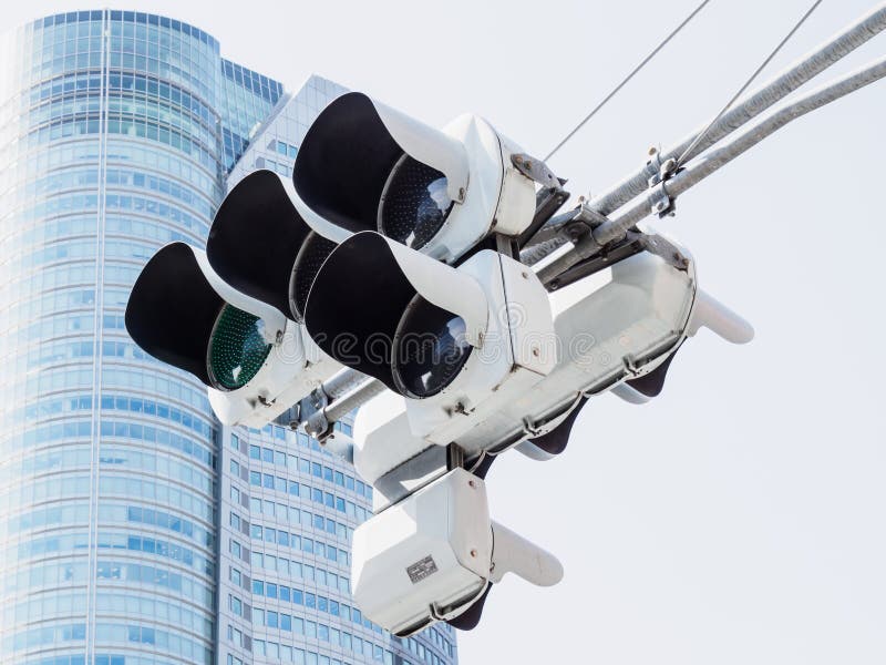 Low Angle Shot of Horizontal White Traffic Lights Hanging in a Street ...