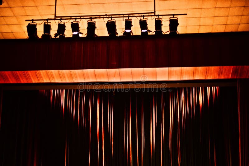 Low Angle Shot of Illuminates Stage Lights on a Stage with Curtains ...