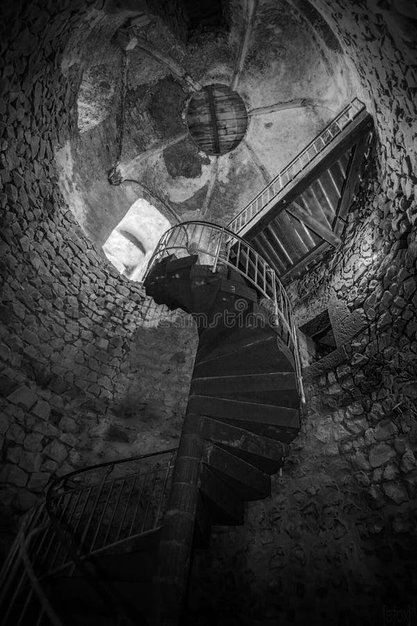 Low-angle Shot of the Inside of an Ancient Castle with a Rotating Stair ...
