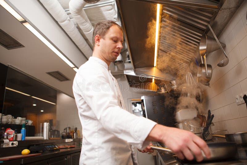 Professional Chef Cooking at the Kitchen Stock Image - Image of cooking ...