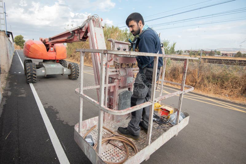 Low Angle Shot of a Man Working at a Construction Site - Concept of ...