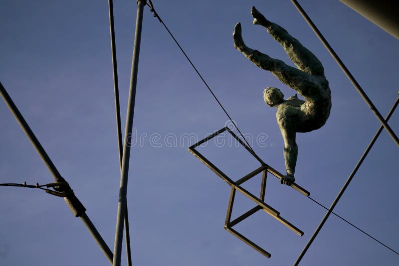 Low Angle Shot of a Metal Sculpture of an Acrobat Editorial Photography ...