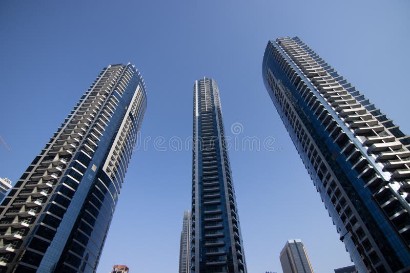Low-angle Shot of Modern Buildings with Multiple Windows Reflecting the ...