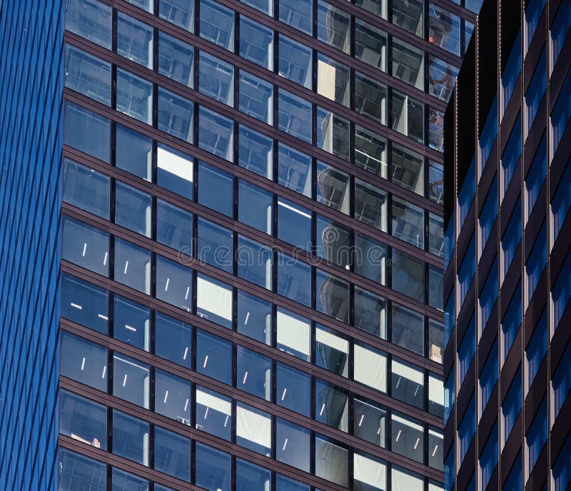 Low Angle Shot of a Modern Business Building in the Middle of the City ...