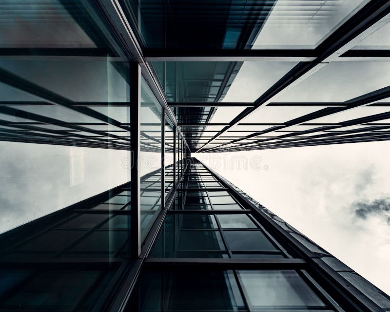 Low Angle Shot of a Modern Skyscraper in Cool Tones Stock Photo - Image ...