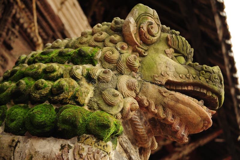 Mossy dragon sculpture stock image. Image of aged, building - 57815313