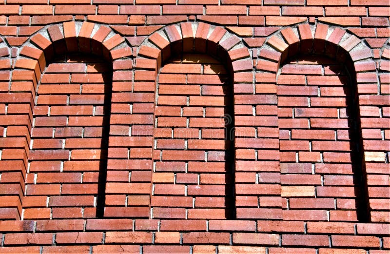 Low Angle Shot of Niches on a Brick Wall Stock Photo - Image of mosaic ...