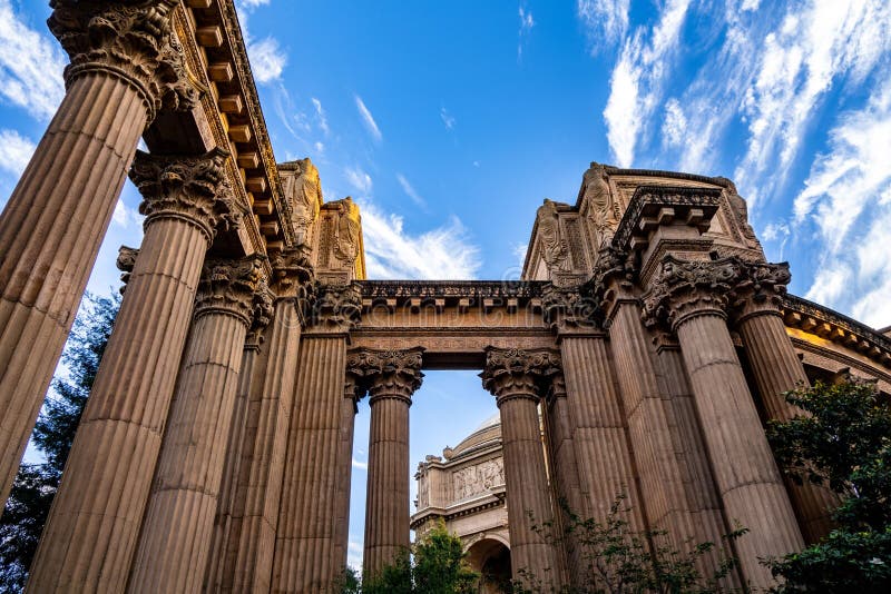 Low Angle Shot of Old Pillars of an Architecture Under Blue Cloudy Sky ...