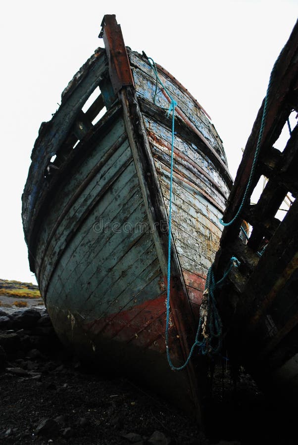 Old Rusty Boat in the Calm Sea Behind the Fence Stock Photo - Image of ...