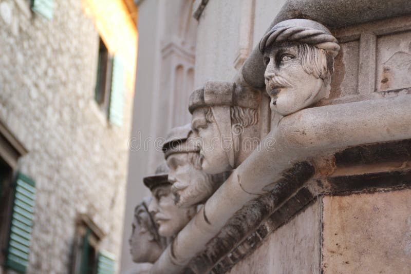 Low Angle of a Stone High-rise Building with Clouds in the Background ...