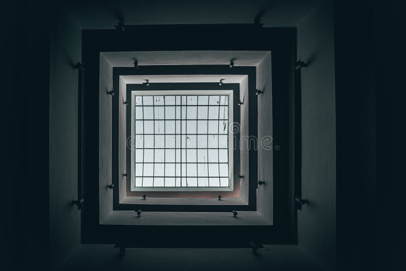 Low Angle Shot of an Open Ceiling with a Grid Fence Stock Photo - Image ...