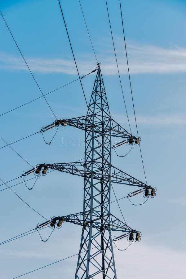 Low Angle Shot of Overhead Electric Power Lines with Insulators Stock ...