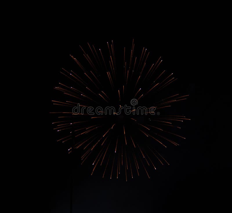 Low Angle Shot of Red Fireworks Popping in the Night Sky Stock Photo ...