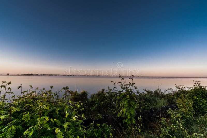 Low Angle Shot of a River and Grassland Stock Photo - Image of park ...