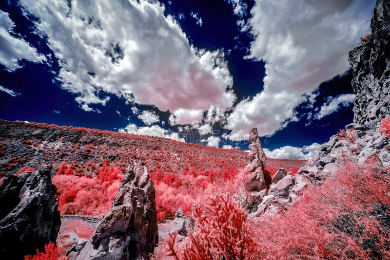 Low Angle Shot of the Rocks in a Desert Under the Beautiful Cloudy Sky ...