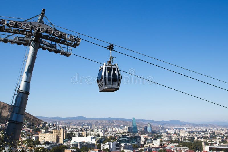 Low Angle Shot of a Ropeway Over the City Under the Clear Sky Stock ...