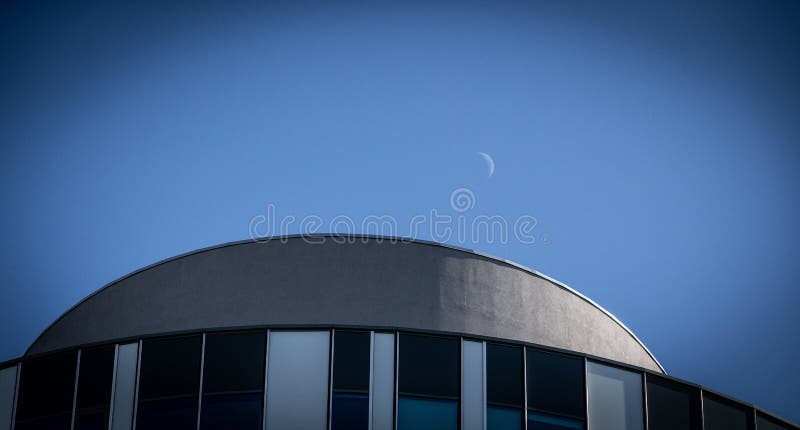 Low Angle Shot of a Round Shape Building on Blue Sky Background Stock ...