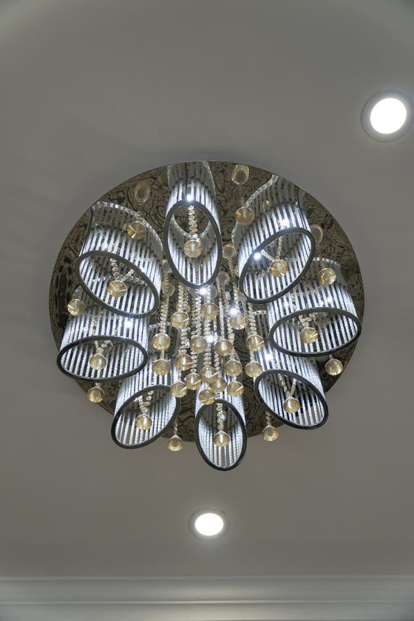 Low Angle Shot of a Saloon Light Fixture on the Gray Painted Ceiling ...