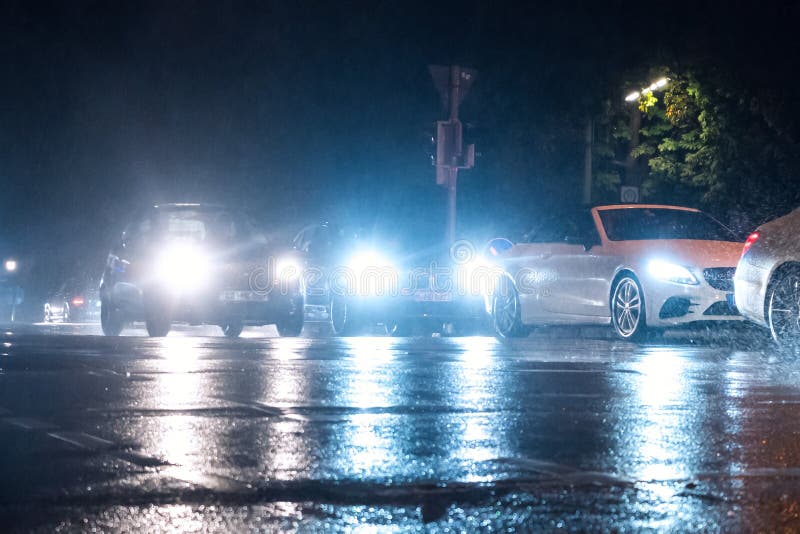 Low Angle Shot of Several Cars on the Street at Night Editorial Photo ...