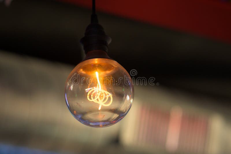 Low Angle Shot of Shining Light Bulb on a Ceiling Stock Image - Image ...