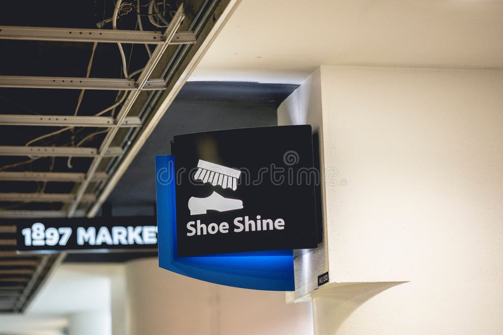 Low Angle Shot of a Shore Shine Sign on the Side of a Wall Stock Photo ...